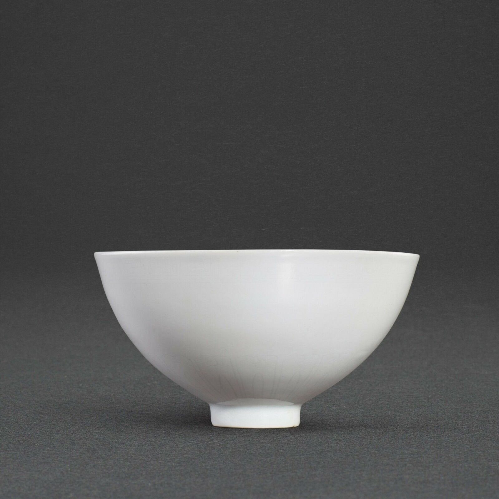 A rare tianbai-glazed incised and anhua-decorated 'lianzi' bowl, Ming ...