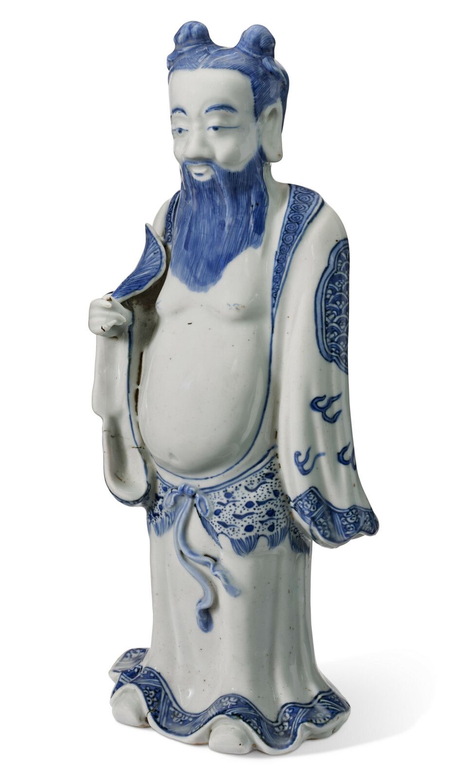 A blue and white figure of a standing Immortal, Wanli period (1573-1620 ...
