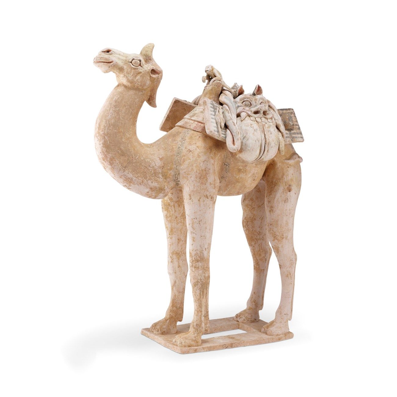 A massive painted pottery figure of a camel and monkey rider, Tang ...